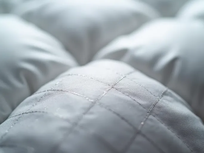 Lightweight Grid Fabrics Challenge Traditional Down in Luxury Apparel
