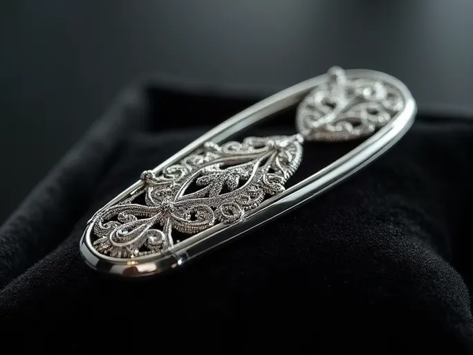 British Artisans Embroider Silver onto Safety Pins
